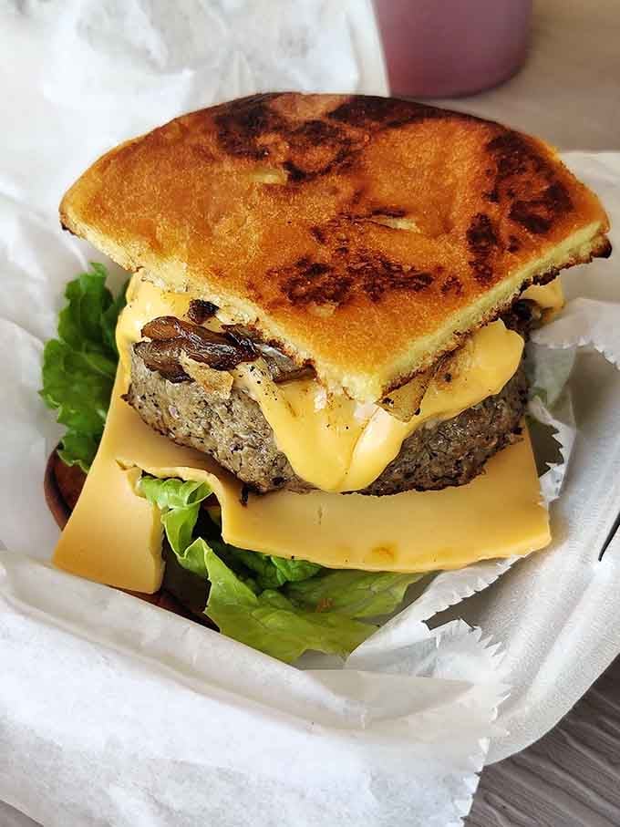 Fresh lettuce, ripe tomatoes, and quality beef come together in this masterpiece that puts fast food to shame.