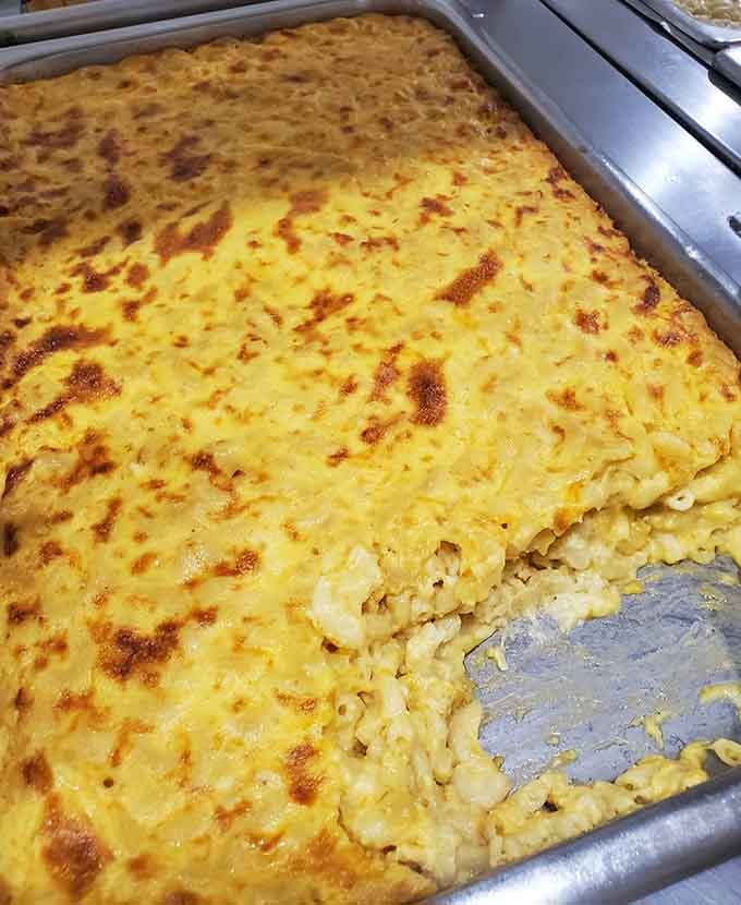 Baked mac and cheese with a bronzed, bubbling top. Southern comfort food doesn't get more honest than this.