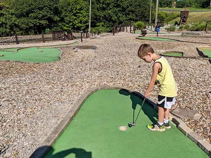Tiny golfer, serious focus, and a course that makes every putt feel like a championship moment.
