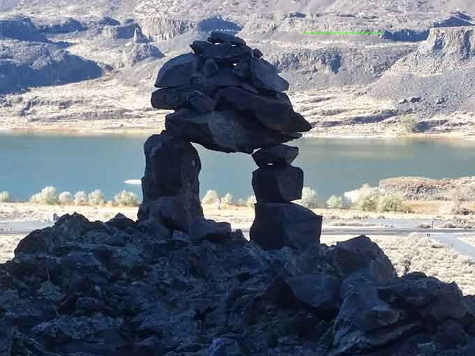 Someone stacked these rocks because apparently we all need to leave our mark, even in prehistoric shelters.