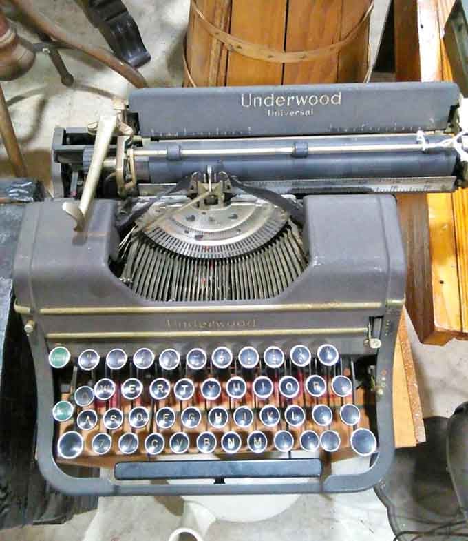 An Underwood Universal typewriter sits quietly, probably judging everyone who complains about their laptop keyboard.