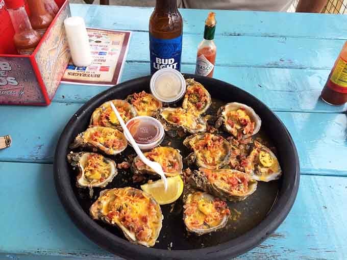 A full tray of Capt. Jack's grilled oysters and a cold beer is the Panhandle version of a perfect afternoon.