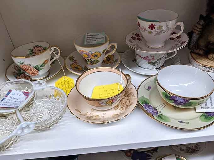 Delicate floral teacups with gold trim, because some things are simply too beautiful to leave behind.