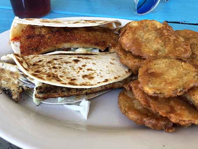 Blackened fish tacos with a side of fried goodness. Lunch just got a serious upgrade.