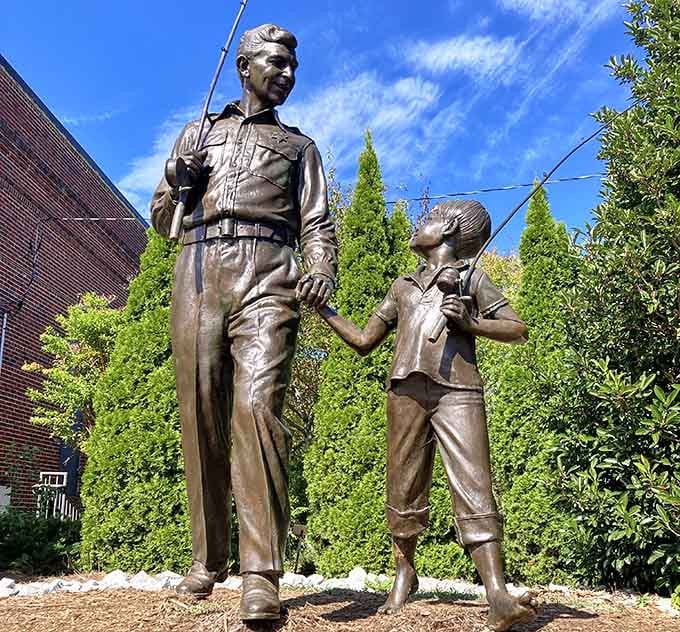 Andy and Opie, frozen in bronze, still heading to the fishing hole like they've got nowhere better to be.