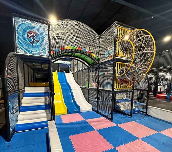 The indoor playground structure proves that good old-fashioned climbing never goes out of style, no matter your age.