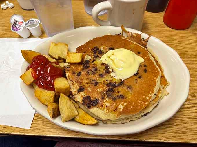 Chocolate chip pancakes with a generous pat of butter on top. Simple, classic, and absolutely impossible to walk past without ordering.