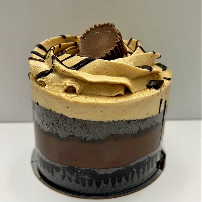 Chocolate, peanut butter, and a Reese's cup on top. This little dessert is not here to make friends. It's here to win.