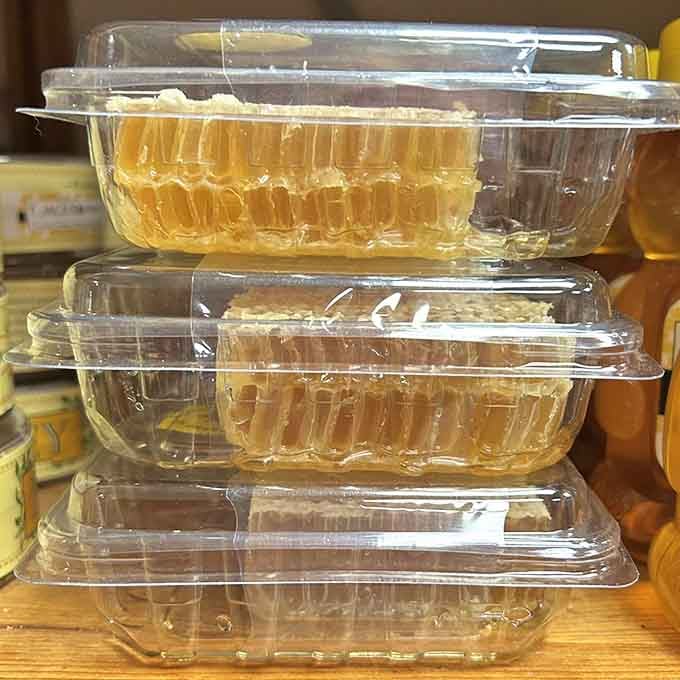 Raw cut comb honey stacked and golden. Nature showing off, and honestly, good for her.