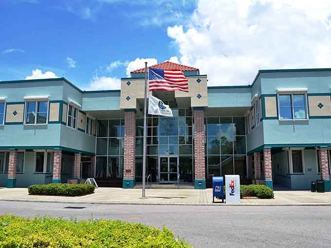 City Hall flies Old Glory with small-town pride, proving good government doesn't require skyscraper-sized bureaucracy to function.