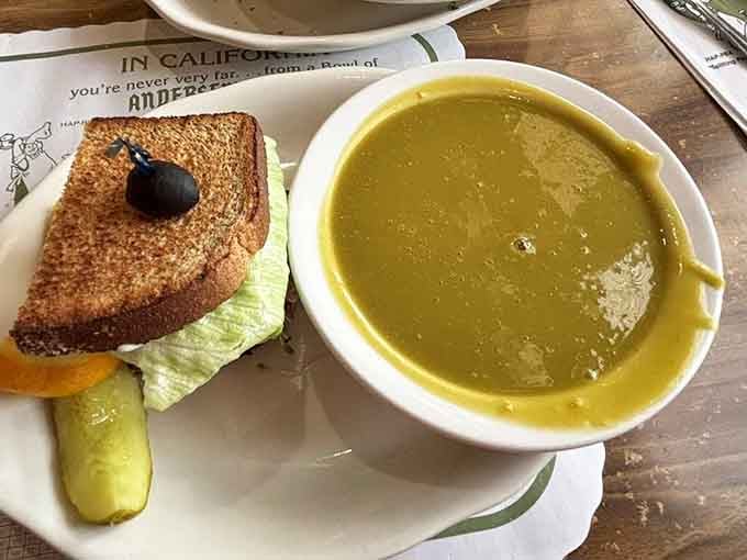 A grilled sandwich and a bowl of that famous green soup together is the road trip combo nobody warned you about.