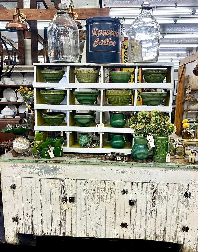 A row of green pottery so perfectly arranged, even your kitchen cabinets are feeling a little jealous right now.