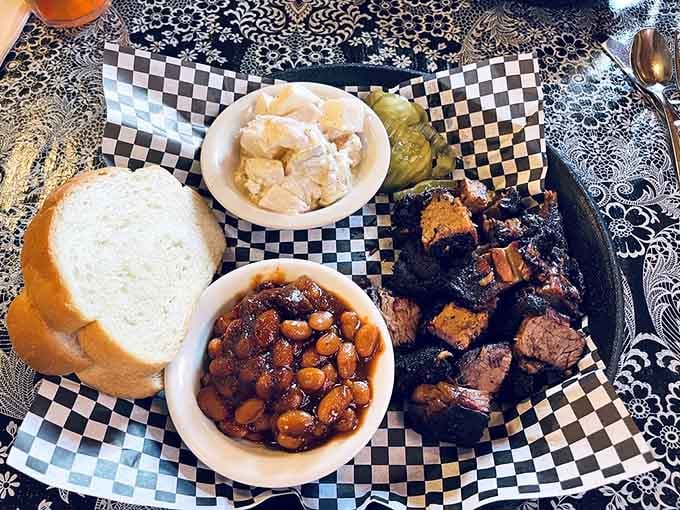 Burnt ends, baked beans, and potato salad together on one plate, this is Missouri comfort food at its finest.