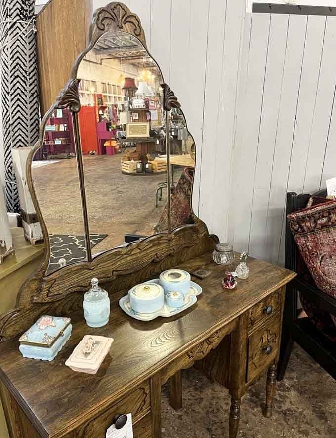 This ornate antique vanity dresser is the kind of piece that makes you want to write letters by candlelight.