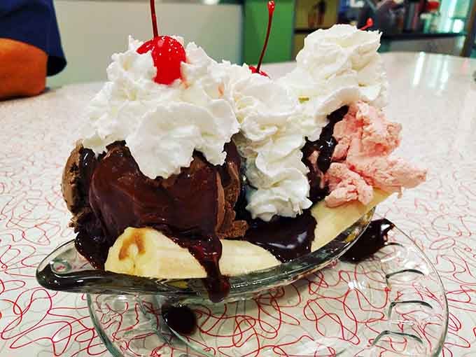 The banana split arrived looking like a celebration, and honestly, every Tuesday deserves one of these.