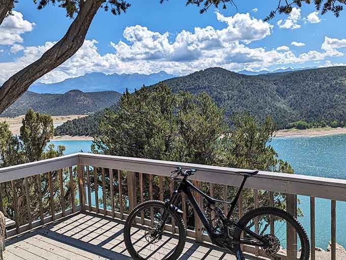 A mountain bike parked at the overlook deck, because the views here deserve a proper standing ovation.