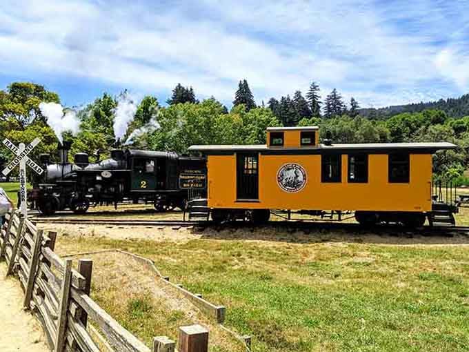 A bright yellow caboose parked against a mountain backdrop. Some things are just classically, unapologetically wonderful, and this is one of them.