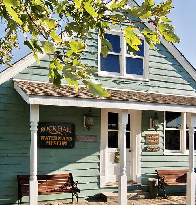 The Rock Hall Waterman's Museum: a sage green building holding generations of Bay harvesting history inside.