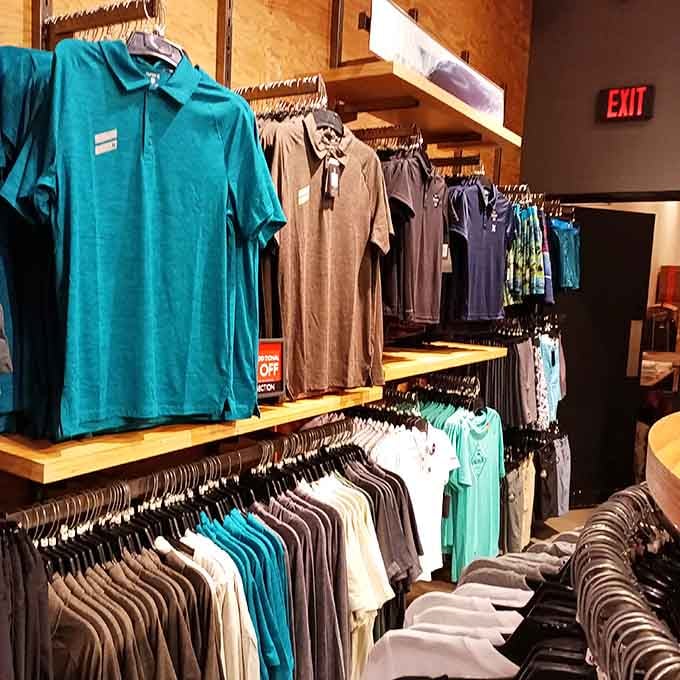 Polo shirts hang in perfect formation, a spectrum of colors ready to upgrade your casual wardrobe without upgrading your budget.