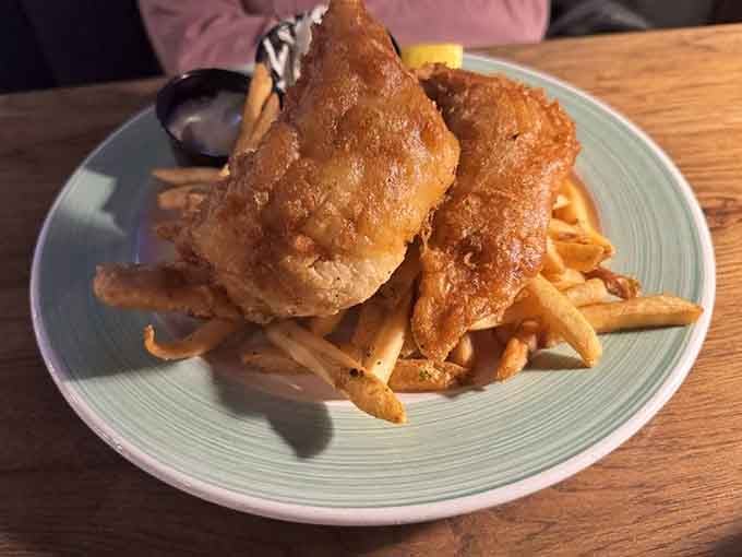 Golden, battered, and gloriously crispy. This Fish and Chips situation is giving classic British pub serious competition.