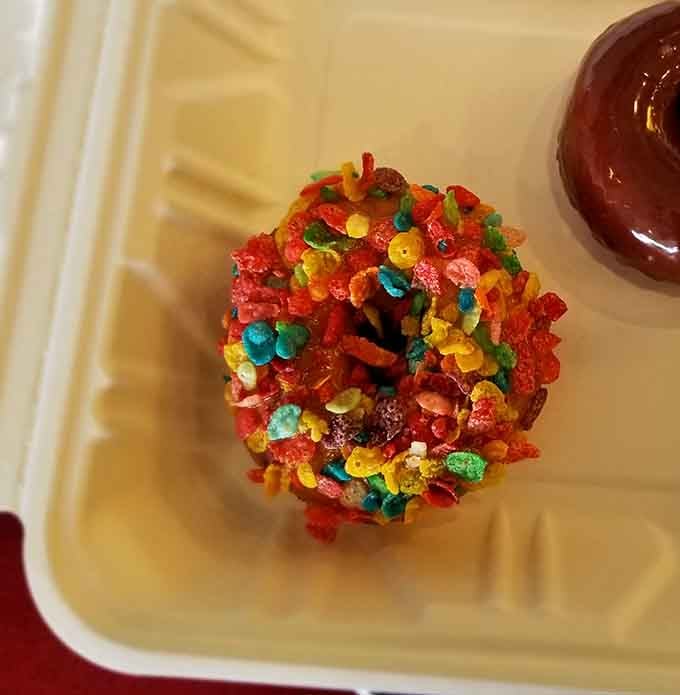 Fruity Pebbles on a donut is the breakfast mashup nobody asked for but absolutely everyone needed. Brilliant chaos.