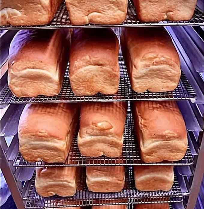 Fresh loaves cooling on the rack, proof that sometimes the simplest things are the most satisfying.