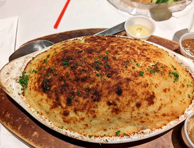 That golden-brown crust on top is hiding something wonderful underneath, and you absolutely need to find out.