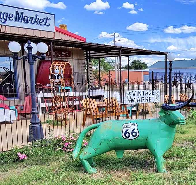 A green longhorn stamped with Route 66 guards this Vintage Market like the world's most charming and opinionated bouncer.