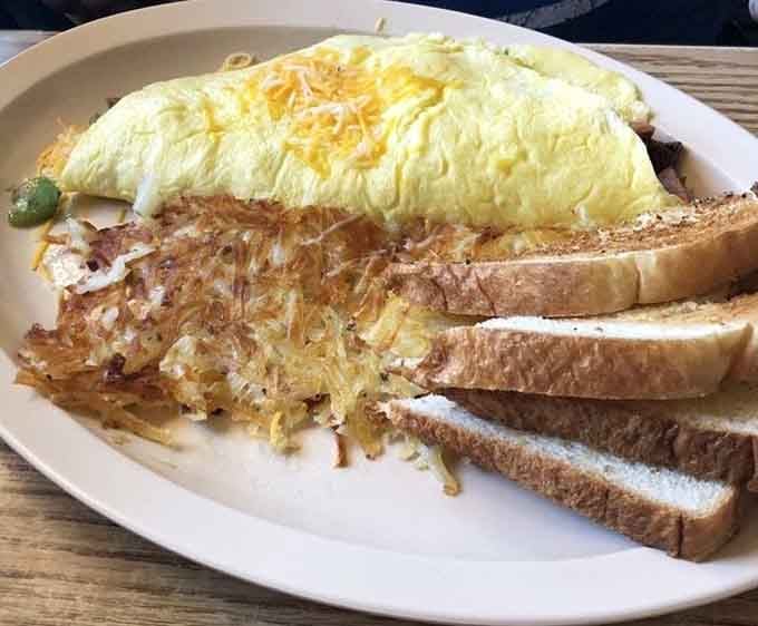 That fluffy omelet with crispy hash browns proves simple ingredients can create extraordinary morning magic together.