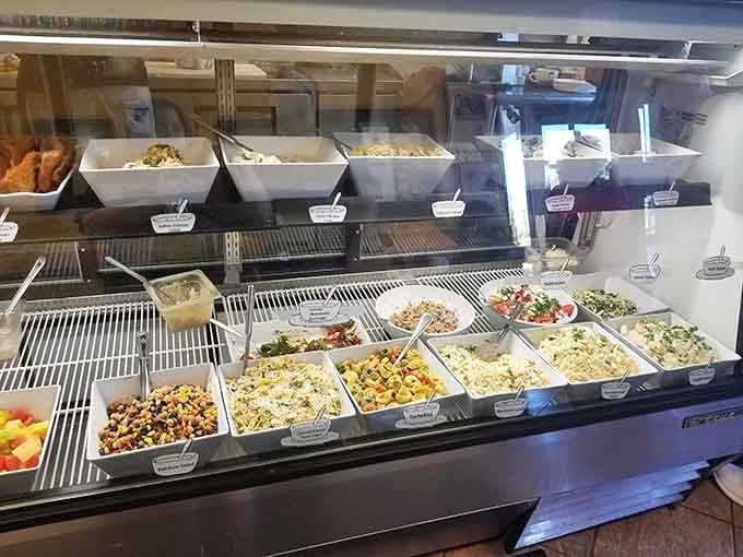 That display case is basically a greatest hits album, except every track is a fresh, colorful salad you actually want to eat.