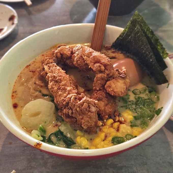 Crispy fried chicken floating in a cheesy Tonkotsu broth is the kind of genius that deserves its own holiday.