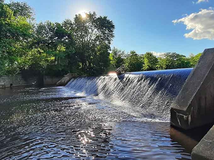 Sunlight catching the spillway just right. Nature showing off again, completely free of charge, no reservation required.