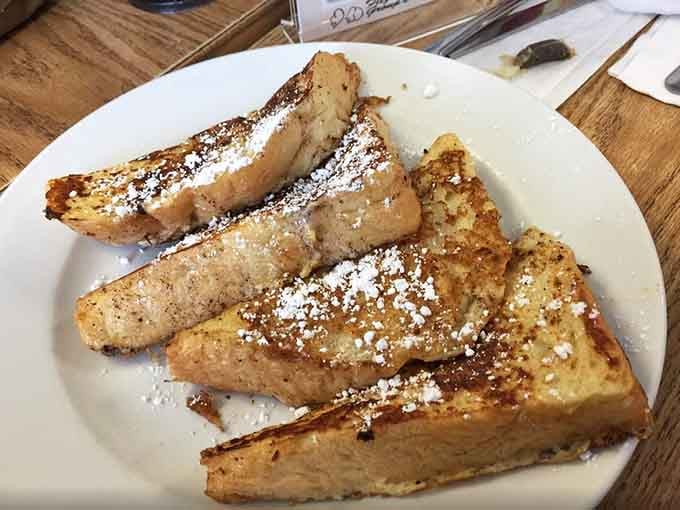 French toast dusted with powdered sugar, golden at the edges, soft in the middle. Breakfast doesn't get better.