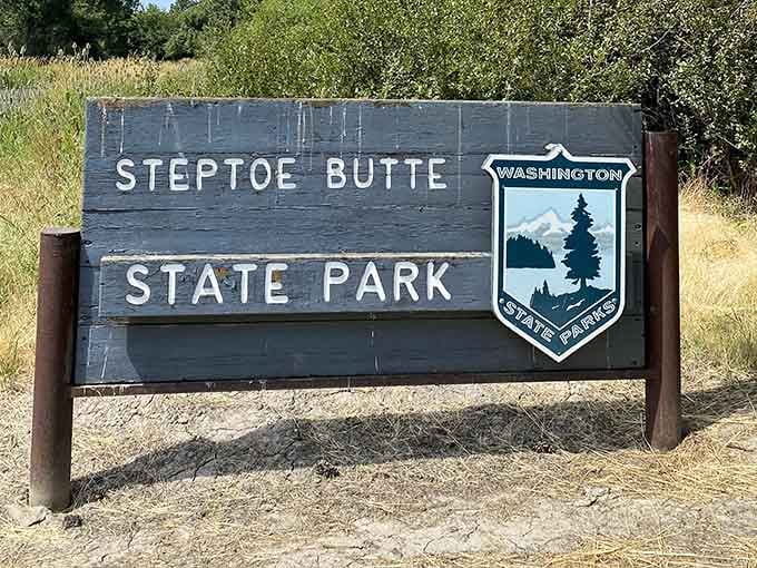 The park sign welcomes you to Washington's best-kept secret, where the evergreens finally take a vacation day.