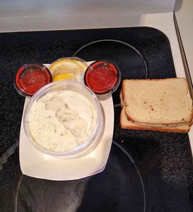 Cocktail sauce, lemon, creamy chowder, and toast together on one tray is a combination that requires zero explanation.