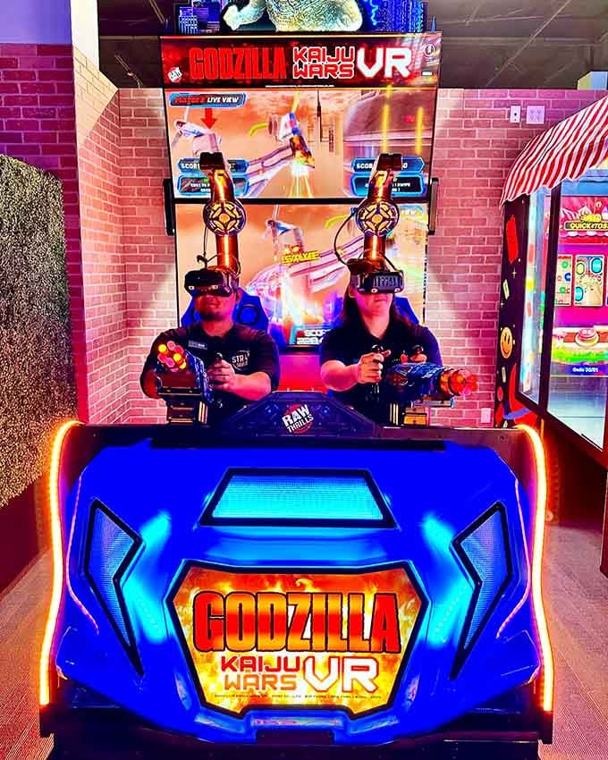 Two brave souls strapping on VR headsets to battle Godzilla &mdash; a Tuesday night well spent, honestly.