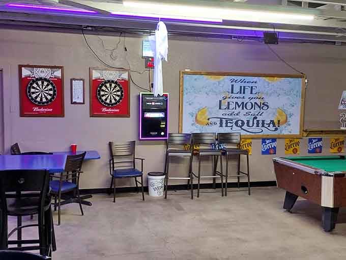 Purple lighting and pool tables suggest this spot knows how to balance relaxation with a little friendly competition.