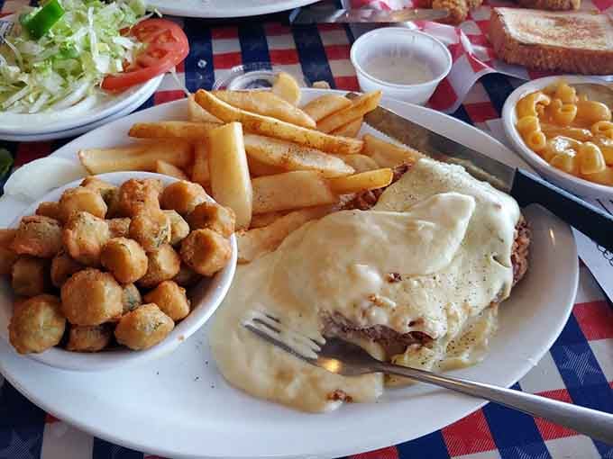 Steak fries, fried okra, and a chicken-fried steak buried under gravy. Somewhere, a cardiologist just felt a disturbance in the force.