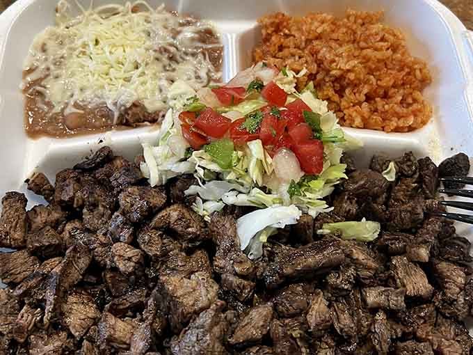 Carne asada, beans, rice, and pico de gallo. This plate means business, serious, delicious business.