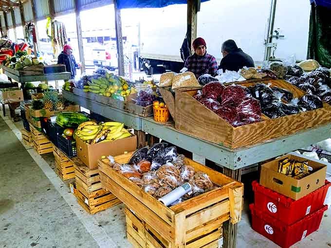 Pineapples, bananas, mangoes, and mystery grains piled high on wooden tables, this produce spread could make any farmers market feel a little self-conscious.