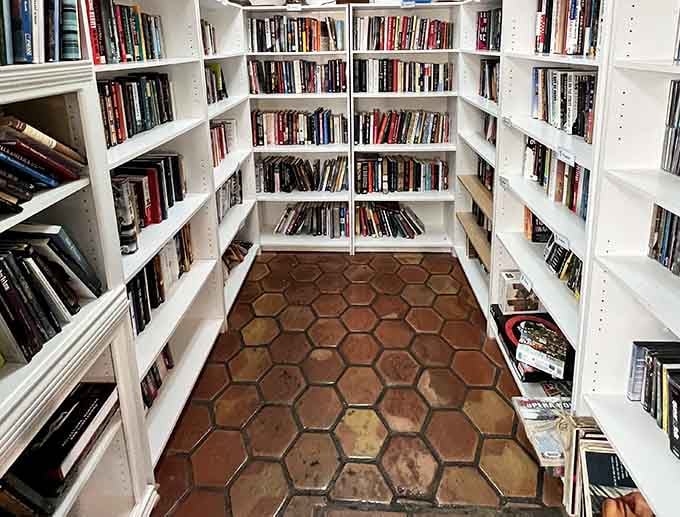 Floor-to-ceiling shelves packed with books, because some treasures are measured in pages rather than carats or thread count.