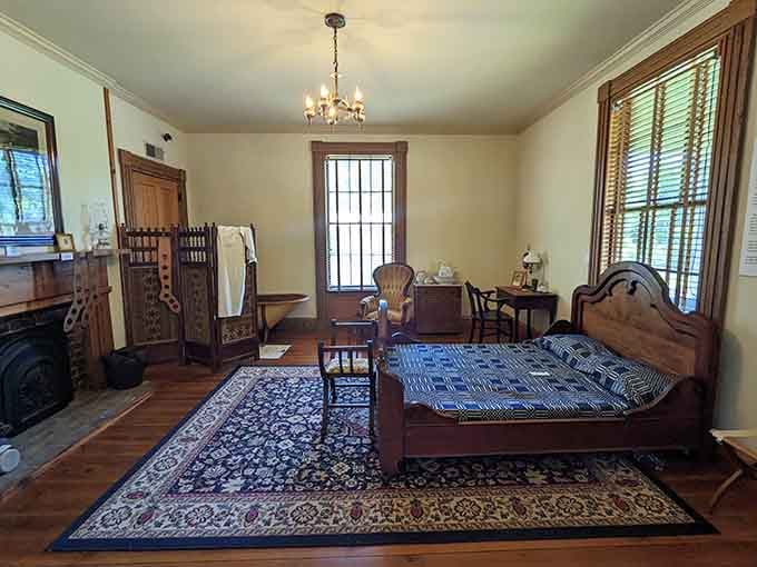 A quiet bedroom frozen in time. Someone once slept here, dreamed here, and hoped the war would end.