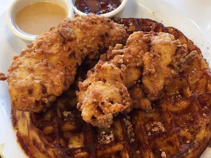Crispy fried chicken perched atop a waffle with mac and cheese is the holy trinity of Southern comfort reimagined brilliantly.