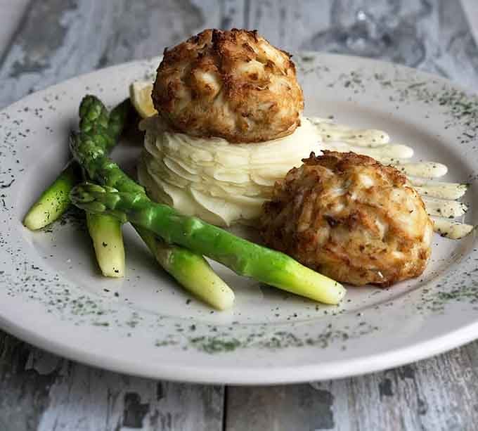 Jumbo lump crab cakes with asparagus. Simple, elegant, and absolutely no apologies for being this good.