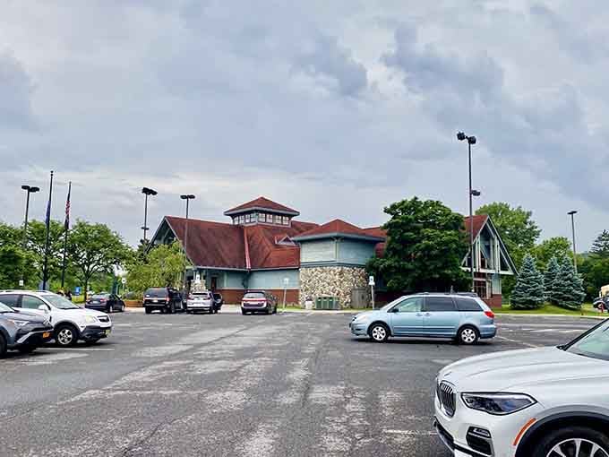 That distinctive architecture with the stone tower standing proud, like a lighthouse guiding shoppers to their discount destiny safely.