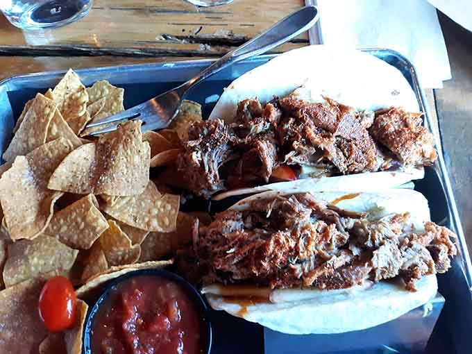 Pulled pork tacos piled so generously high, you'll need both hands and zero distractions.