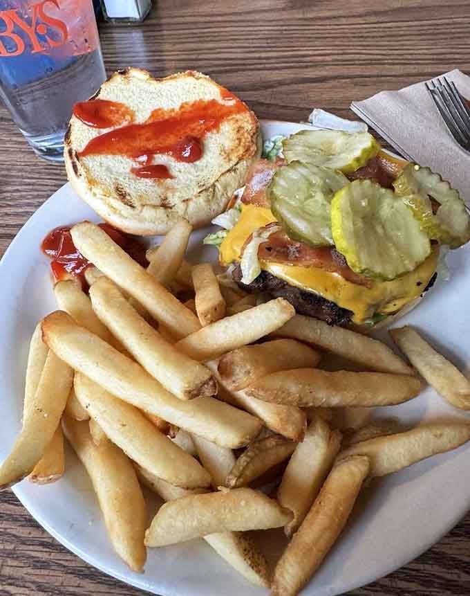 This deluxe bacon cheeseburger with fries shows they take their land-based offerings just as seriously as their seafood.