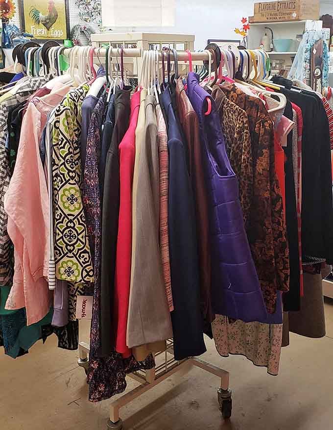 A rack full of colorful vintage garments just waiting for someone with the confidence to pull them off.