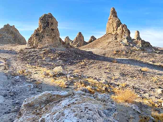 Up close, the tufa formations look sculpted by hand, rough, textured, and impossibly dramatic in the morning light.