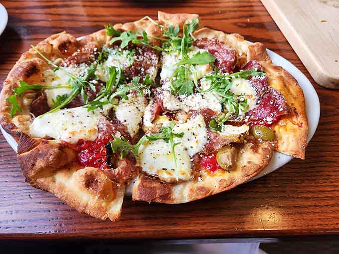 When your pizza arrives topped with fresh arugula and perfectly charred crust, you understand why Italians are so particular.
